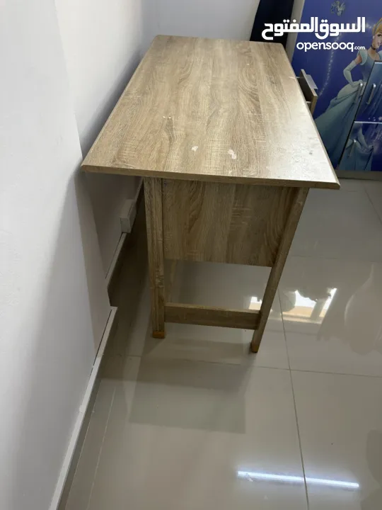 One computer Table one coffee table coffe table is a marbal ...