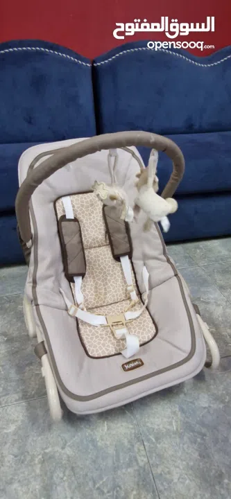juniors baby swing : مستلزمات أطفال : مسقط المعبيلة (250132209)